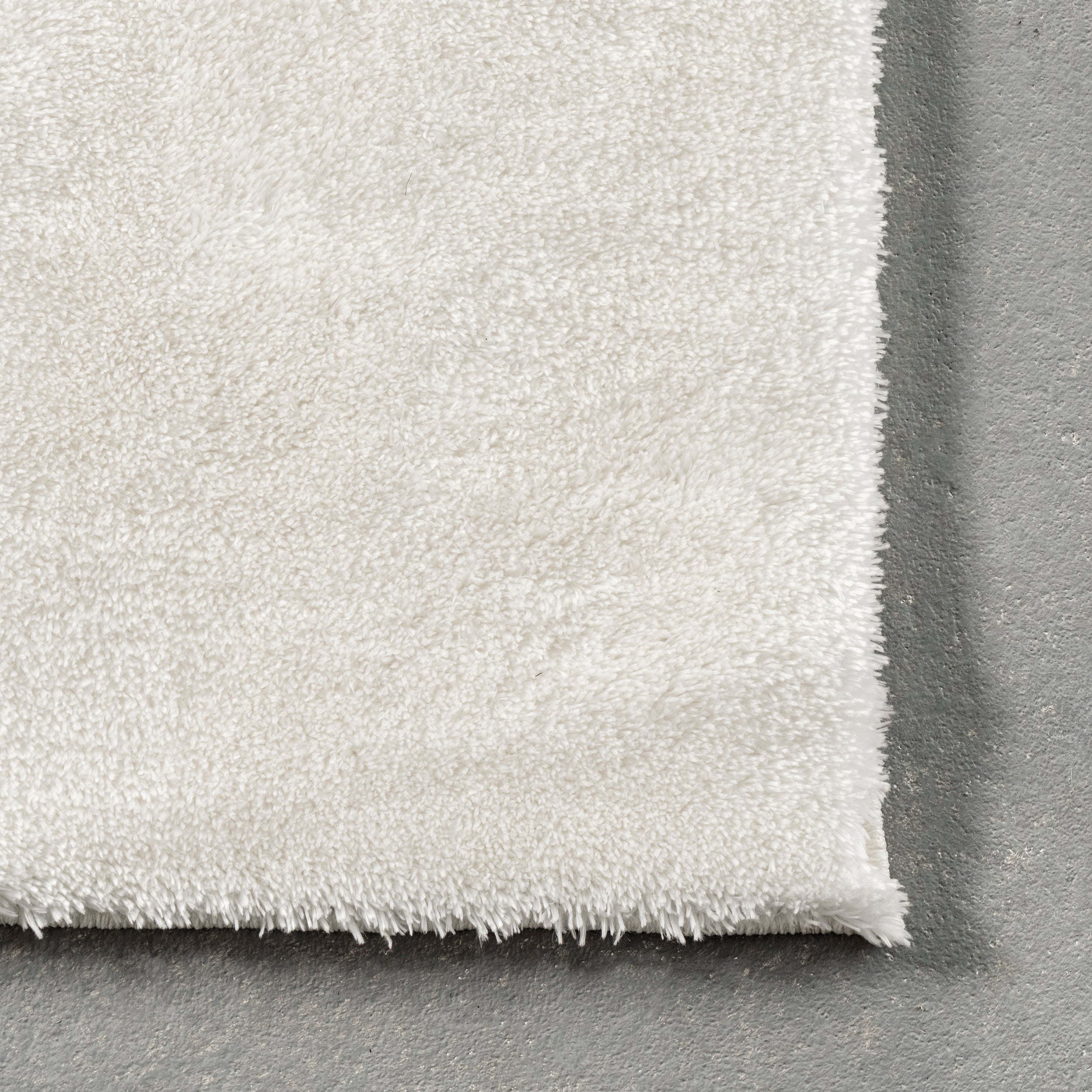 Loni Solid Machine Washable Shag Area Rug — nuLOOM