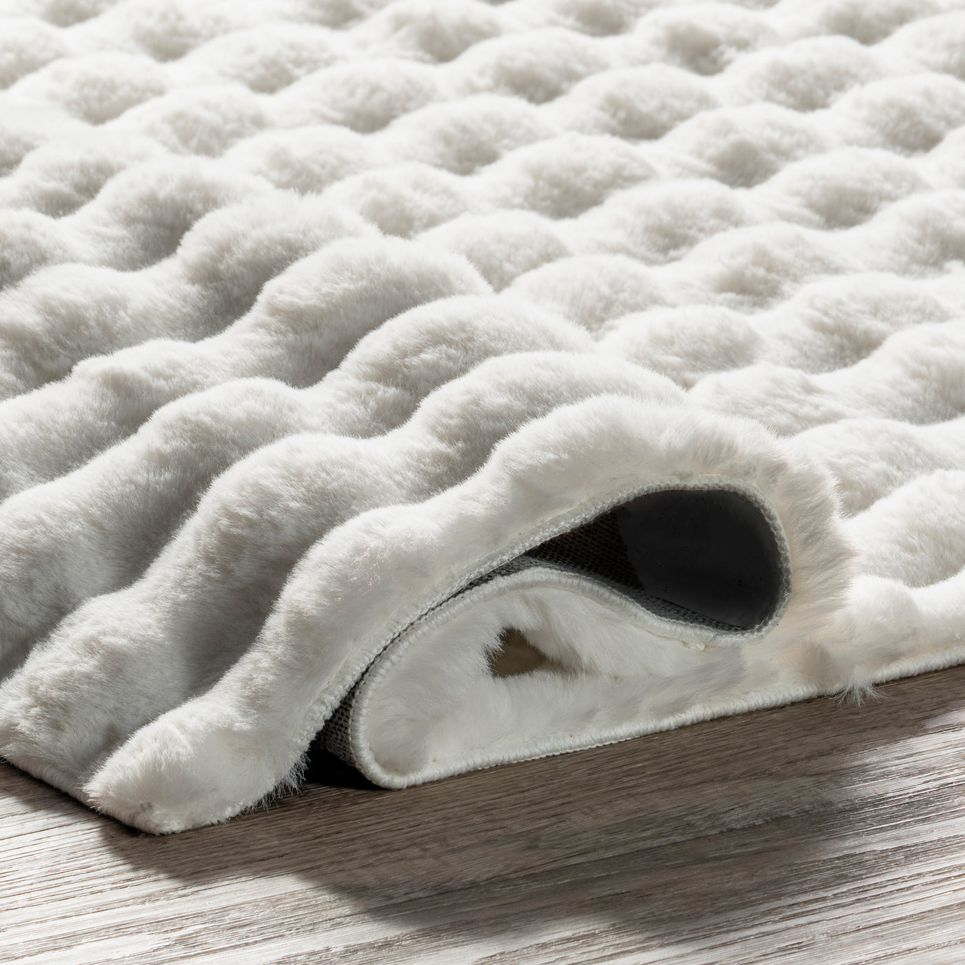 Jeni Solid Faux Rabbit Machine Washable Area Rug — nuLOOM