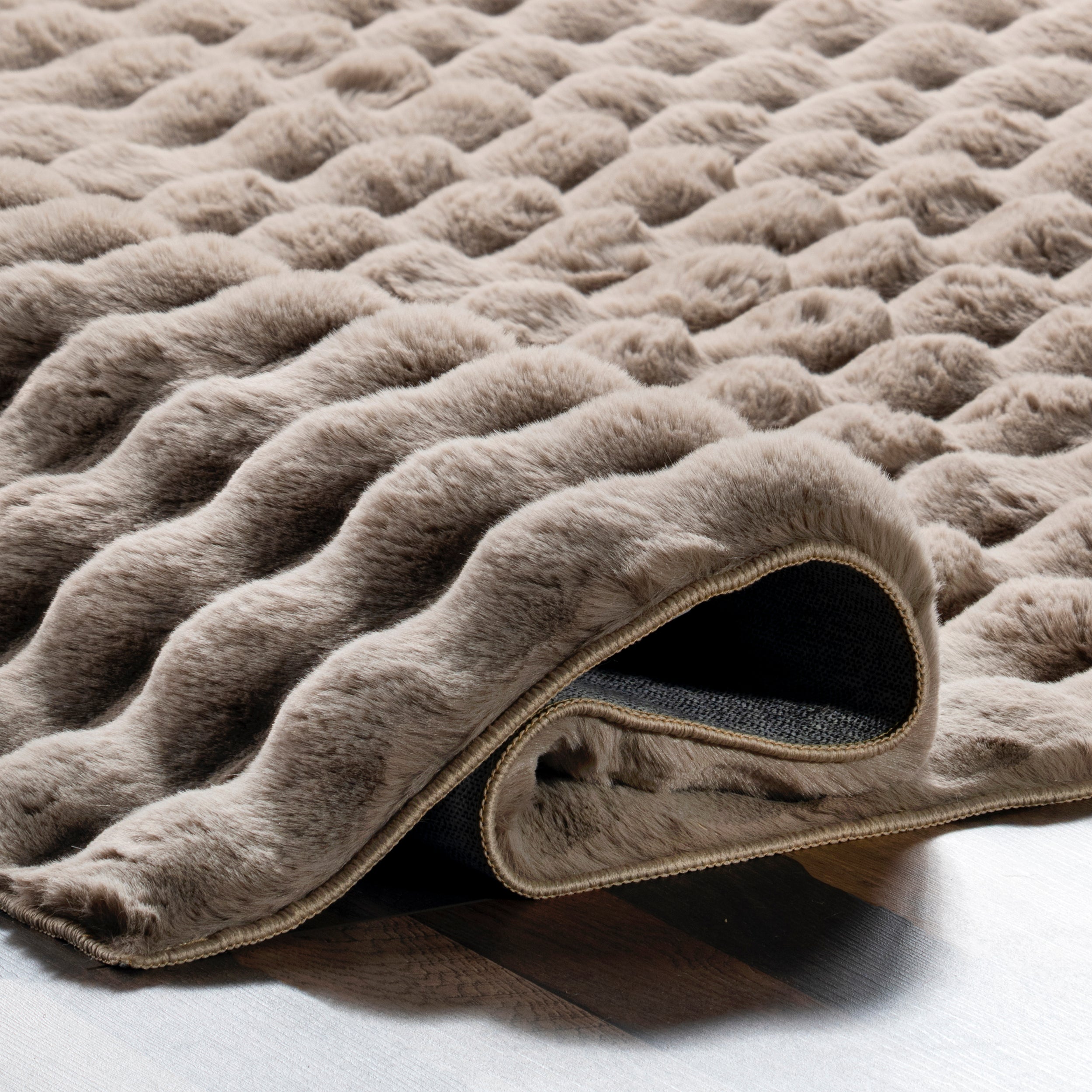 Jeni Solid Faux Rabbit Machine Washable Area Rug — nuLOOM